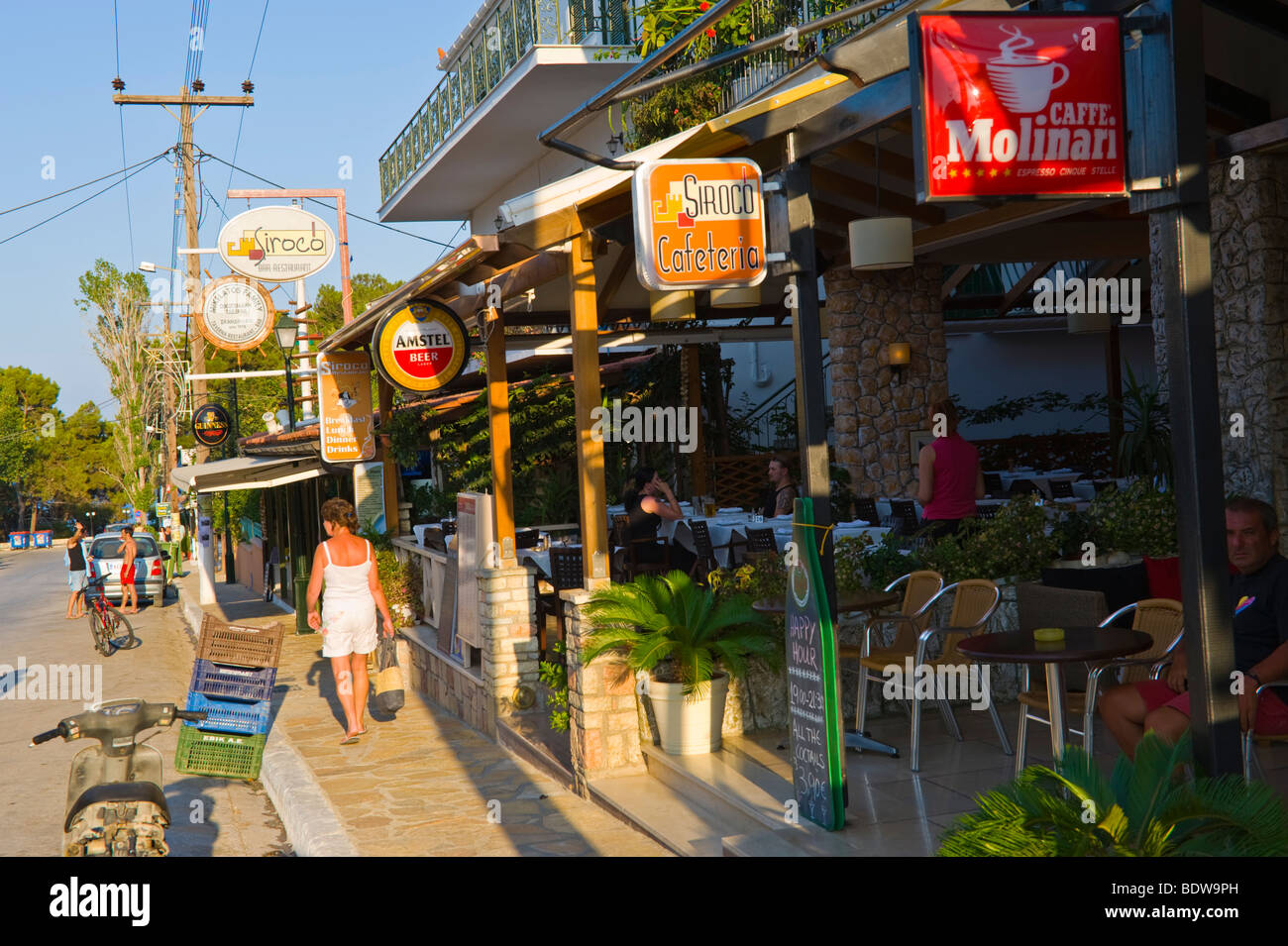 View down main street in village of Skala on the Greek Mediterranean ...