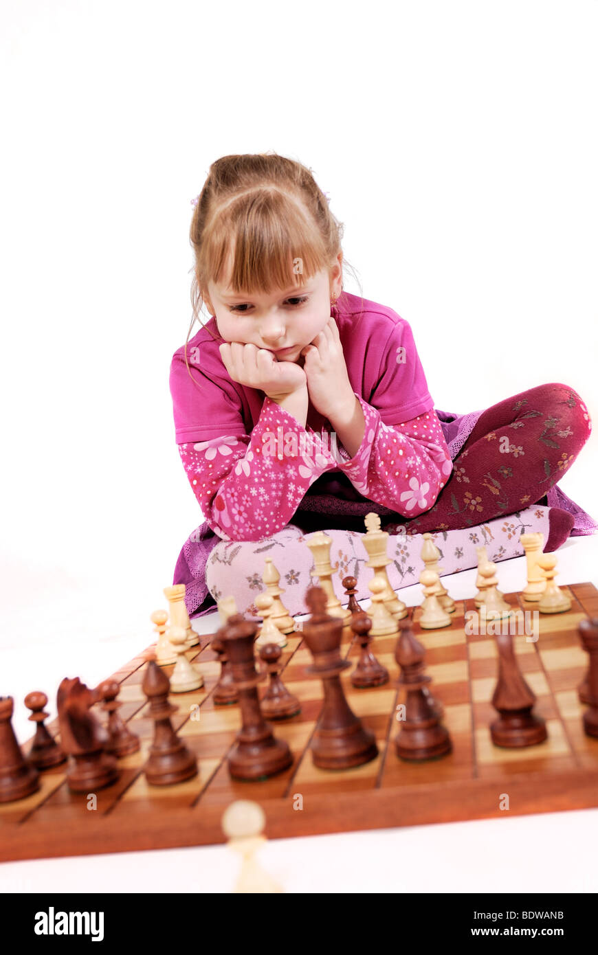Girl with chess Stock Photo - Alamy