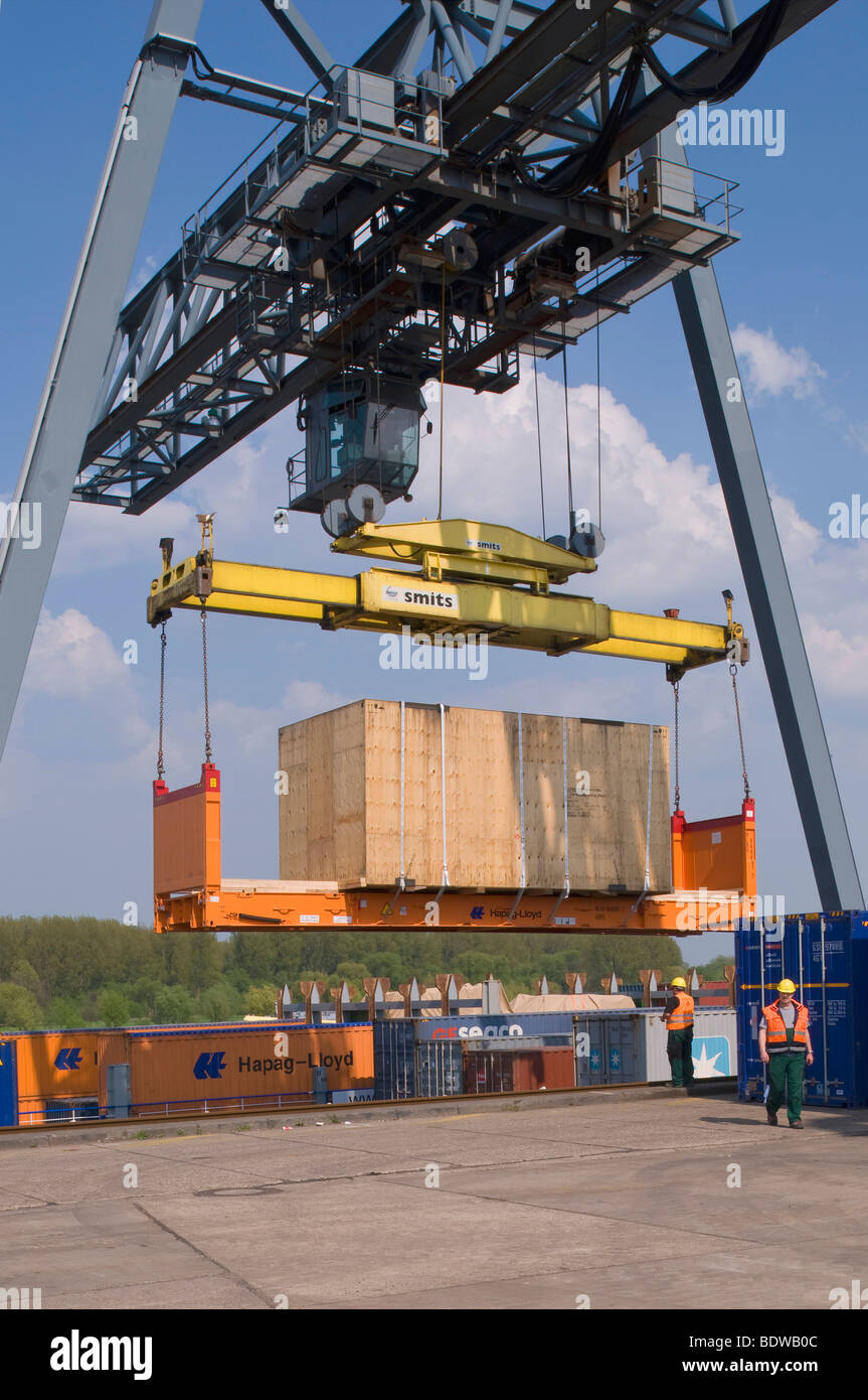 Container terminal Bonn, container crane lifts special cargo on a ...