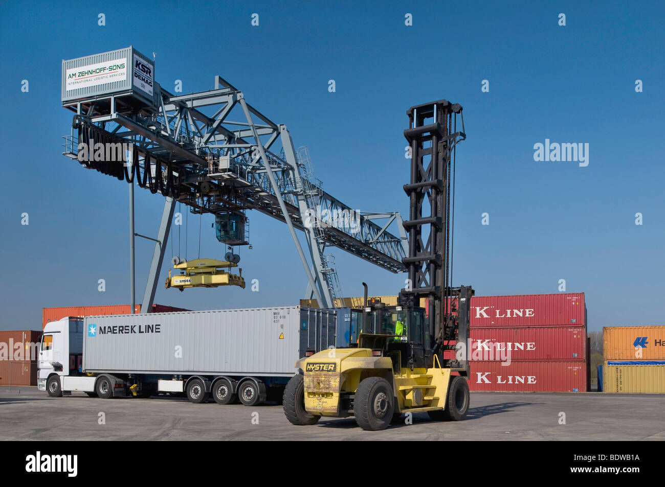Bonn container terminal, container crane and reach stacker next to a ...