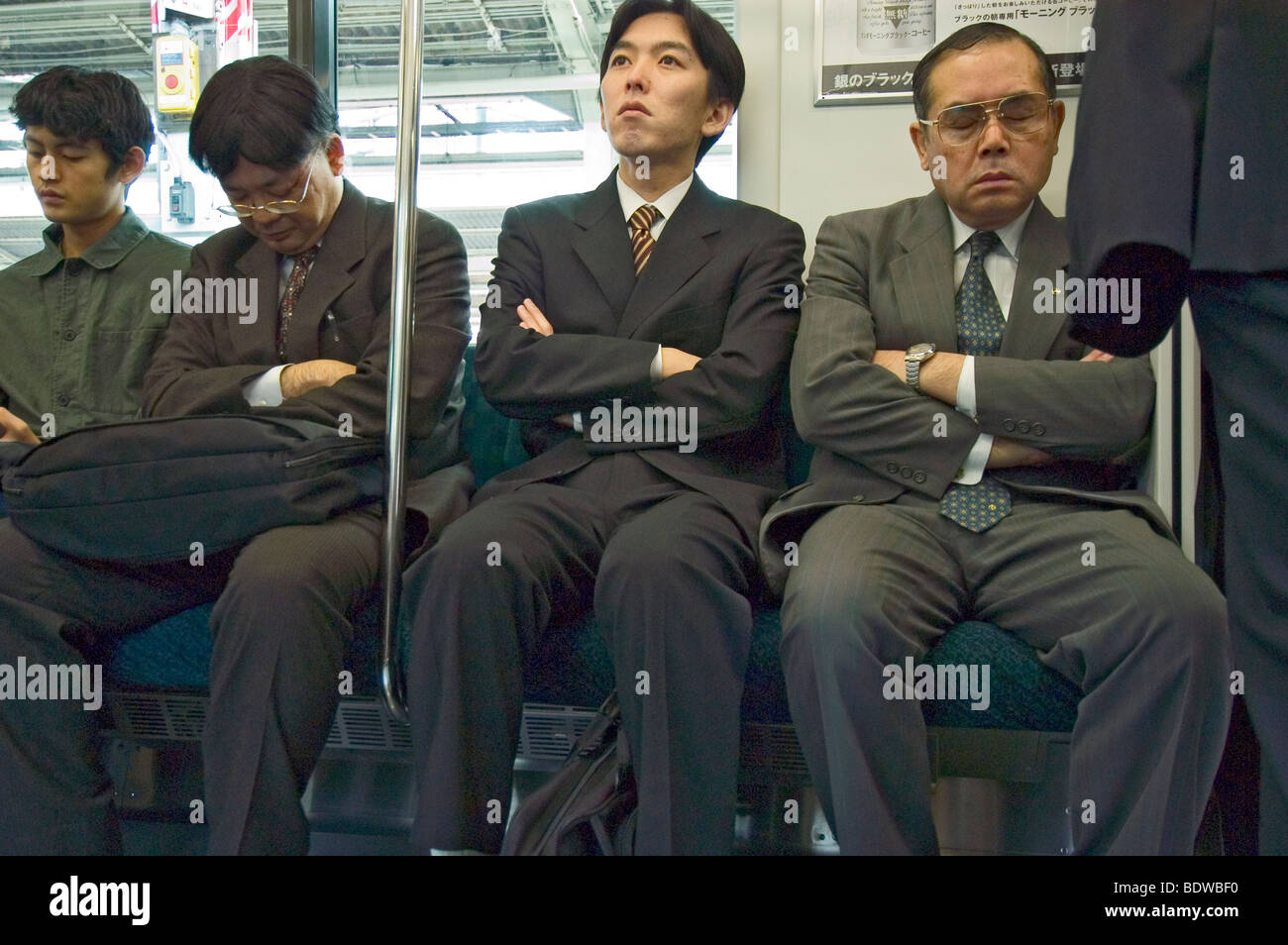 Japanese businessmen commuting by subway at Tokyo Stock Photo - Alamy