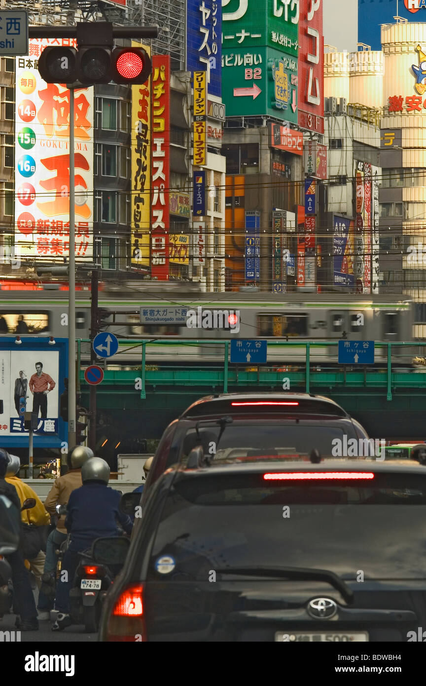 Traffic, subway and ad signs, Shinjuku, downtown Tokyo, Japan Stock ...