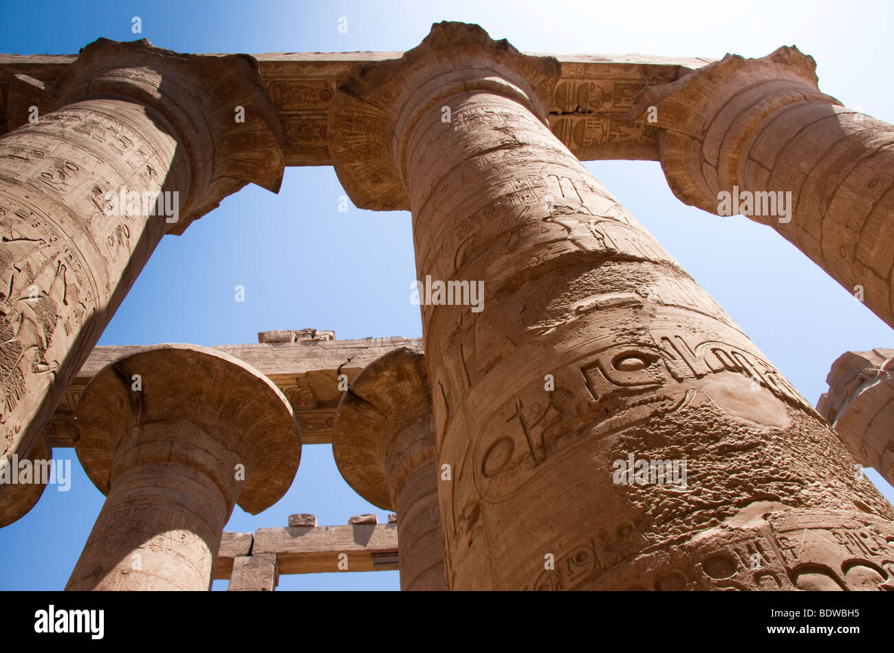Huge columns stretch skywards in the Hypostyle Hall at the Temple of ...