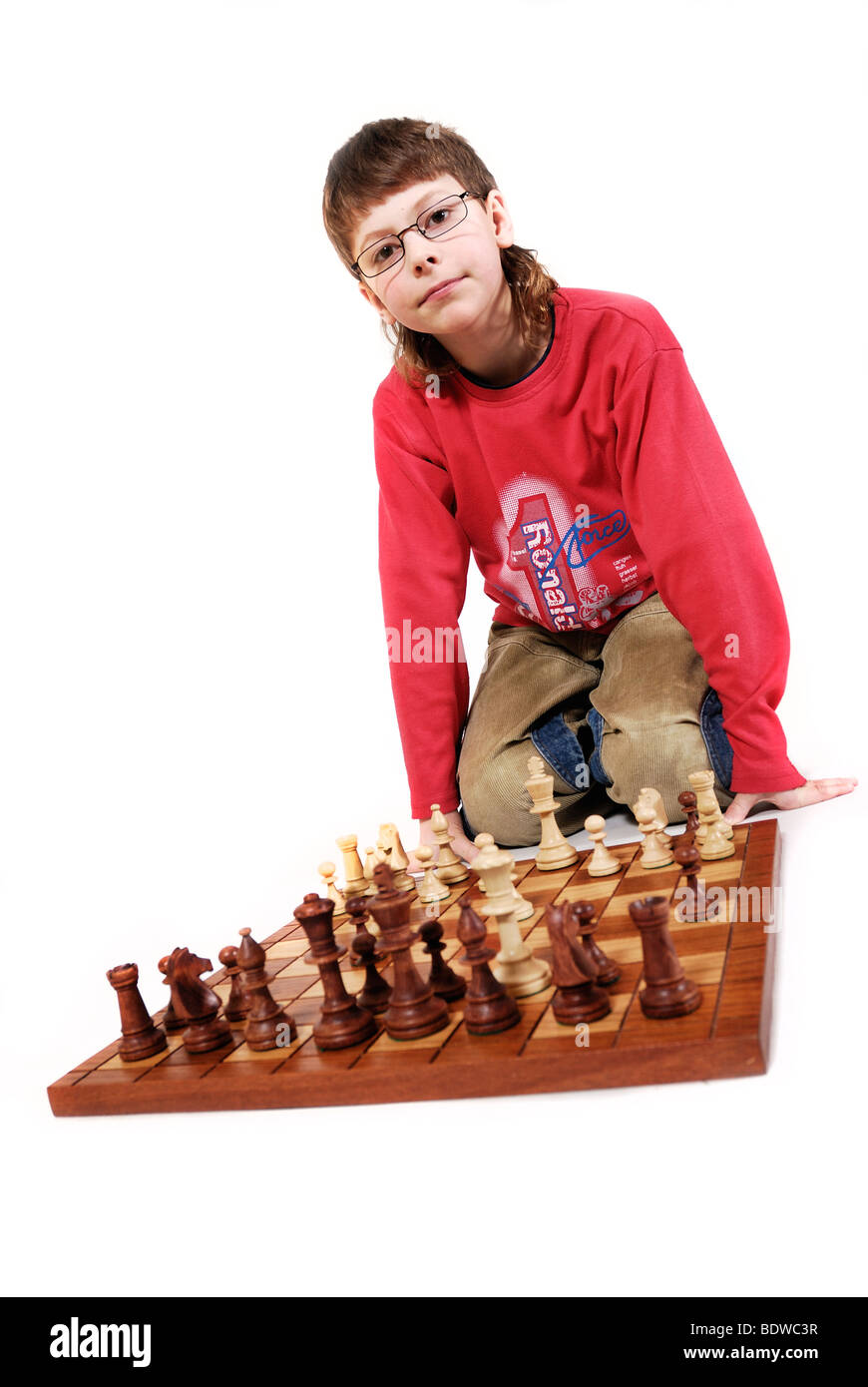 Boy with chess Stock Photo - Alamy