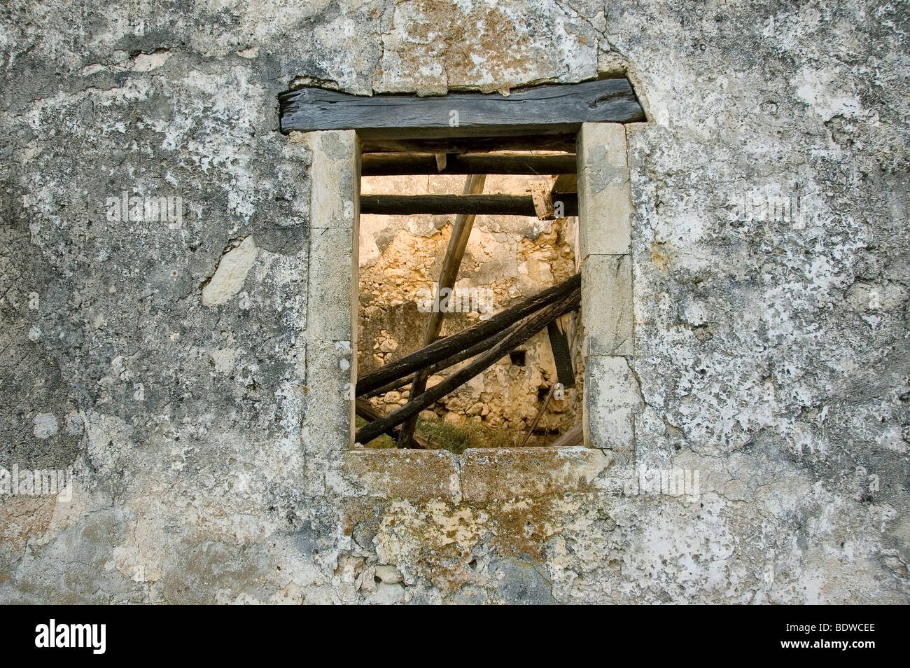 Stone wall and window detail. Abandoned house exterior Stock Photo - Alamy