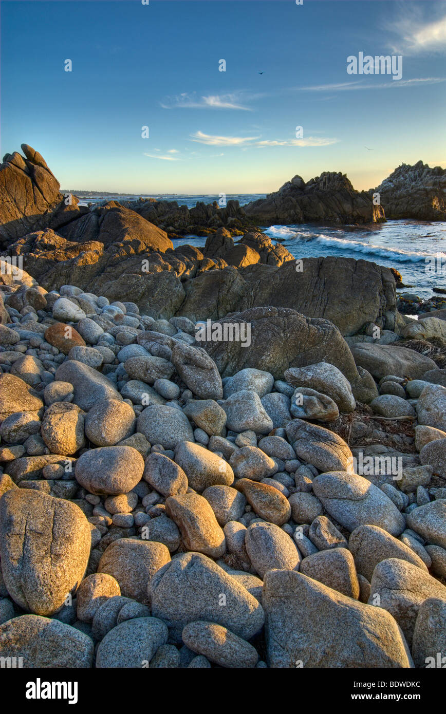 Rocky Asilomar Beach in Monterey Bay at sunset Stock Photo - Alamy