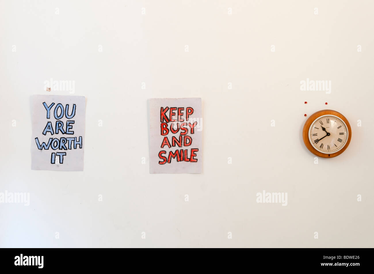 Motivational signs on wall of person suffering from depression, England ...