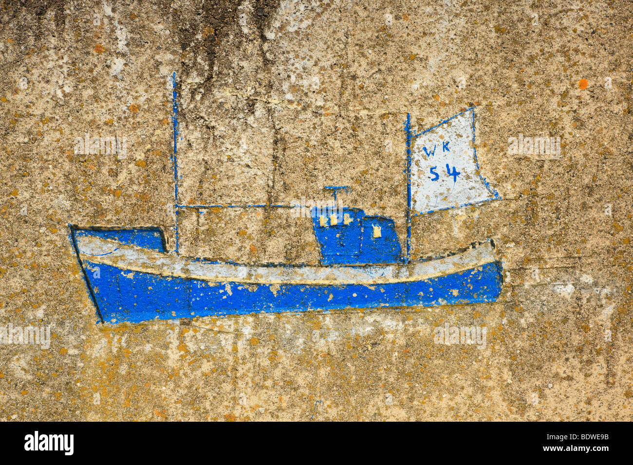 Pictures of boats are etched into the concrete harbour walls at Harrow ...