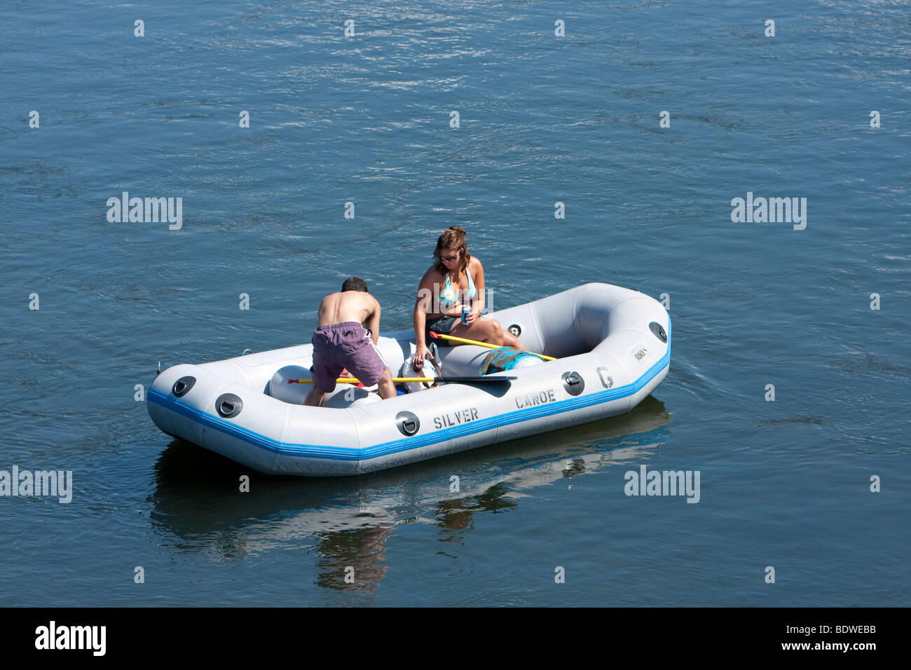 A young couple out for the day on the Delaware River. Floating down the ...