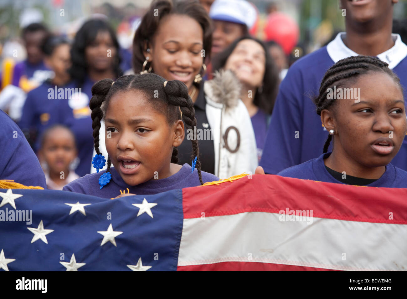 Detroit, Michigan - Girls carry an American flag at the Labor Day ...