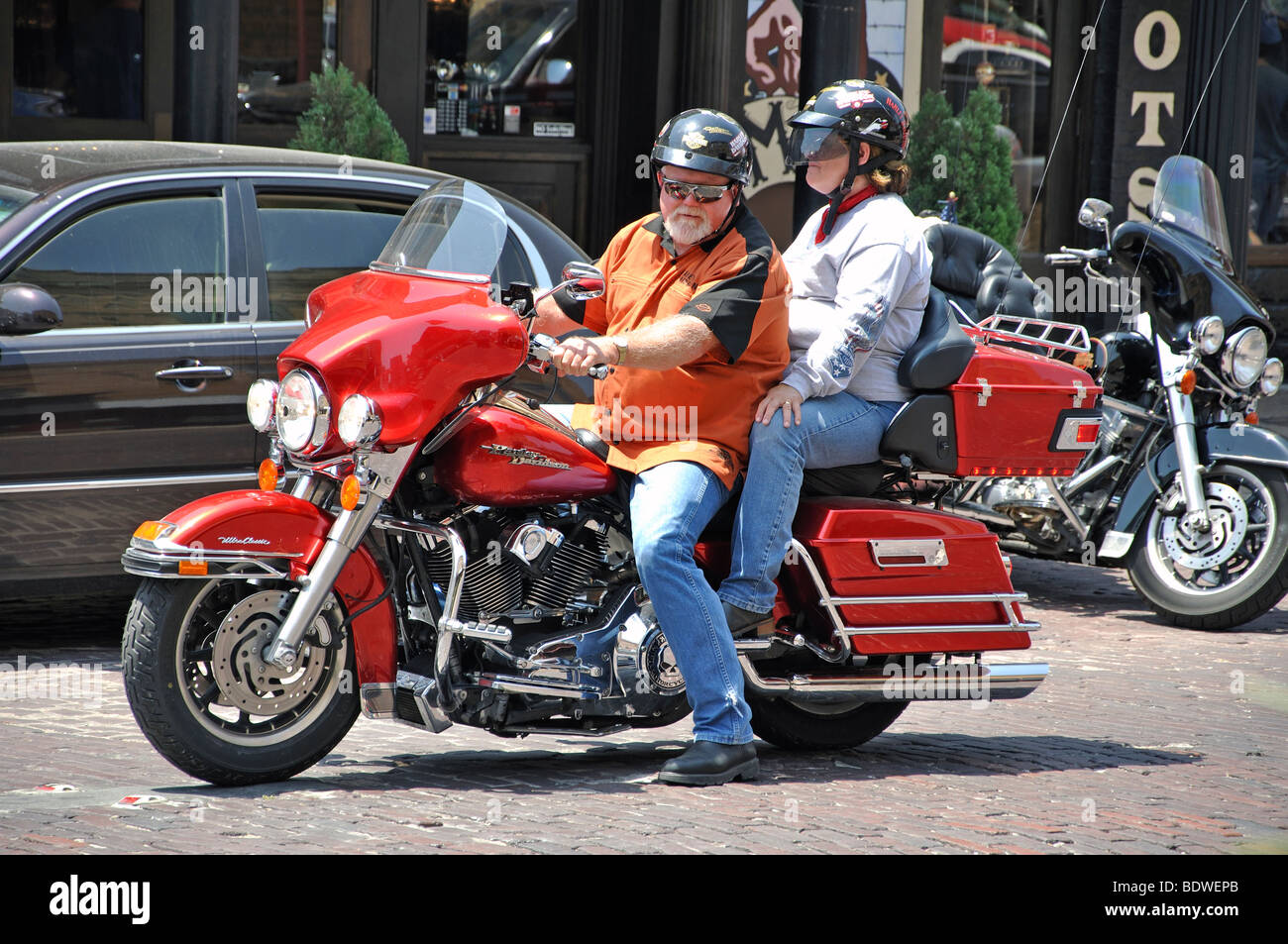 Couple riding harley davidson motorcycle hi-res stock photography and ...