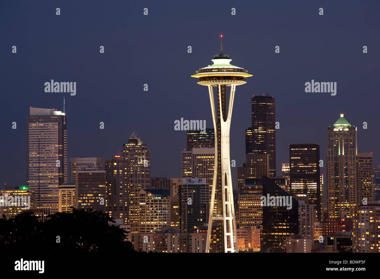 Retro image of Space Needle and downtown Seattle at night and city ...
