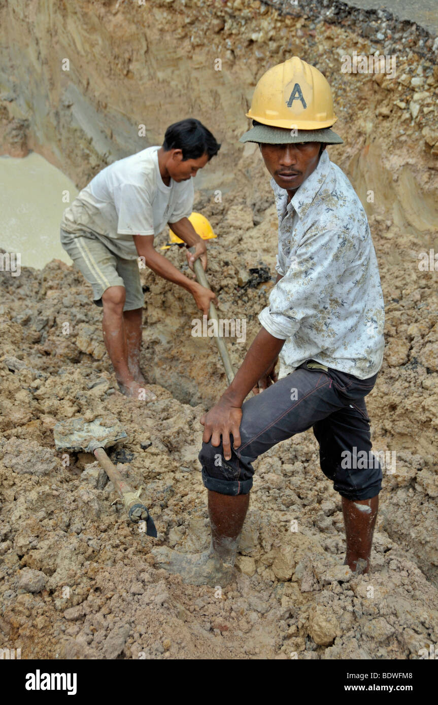 Construction workers on a building site in Siem Reap, Cambodia, Asia ...
