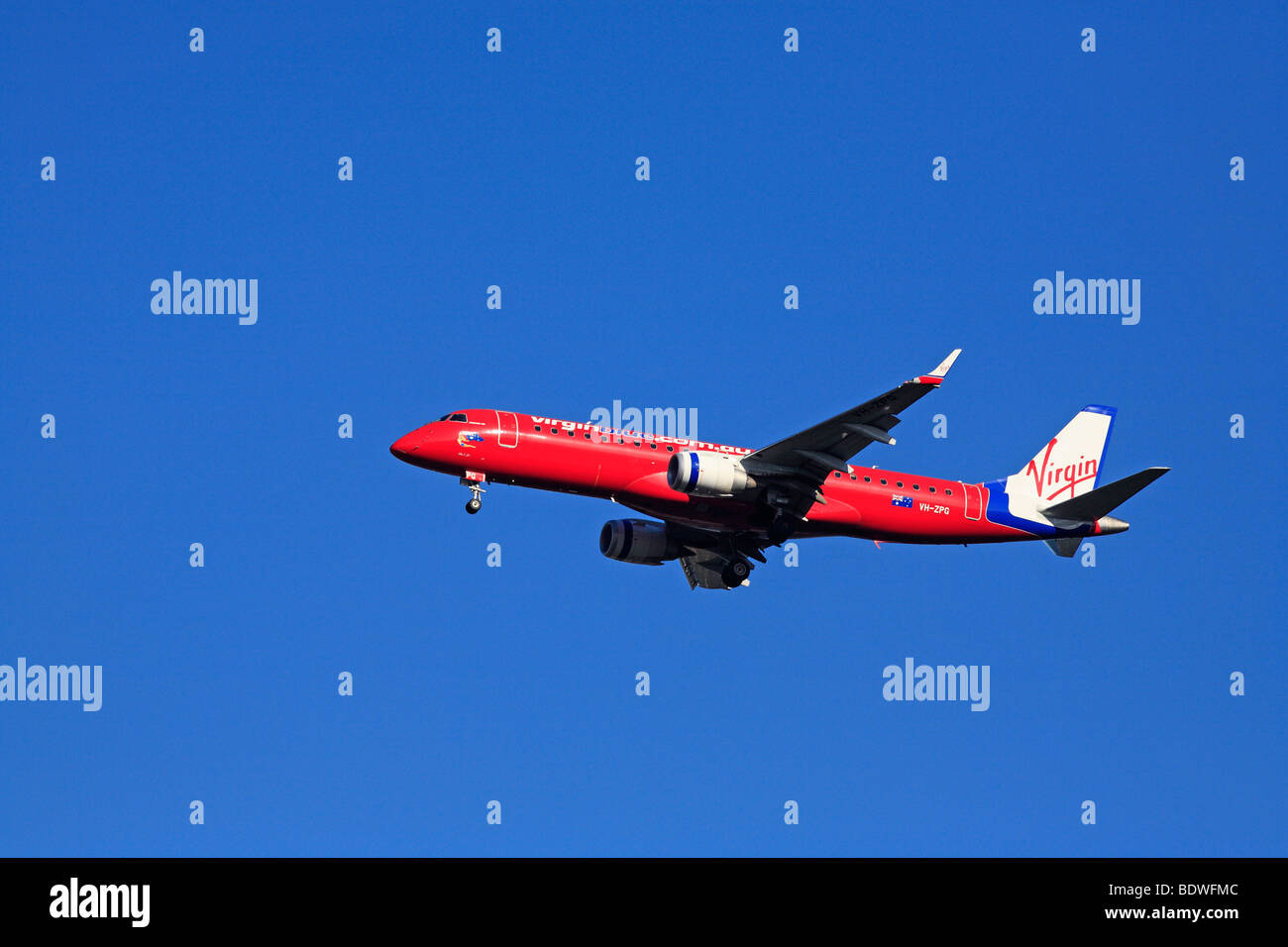 Virgin Embraer 190 Aircraft in flight Stock Photo - Alamy