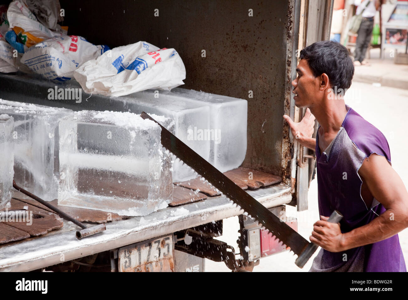 Purified ice delivery, Cambodian style Stock Photo - Alamy