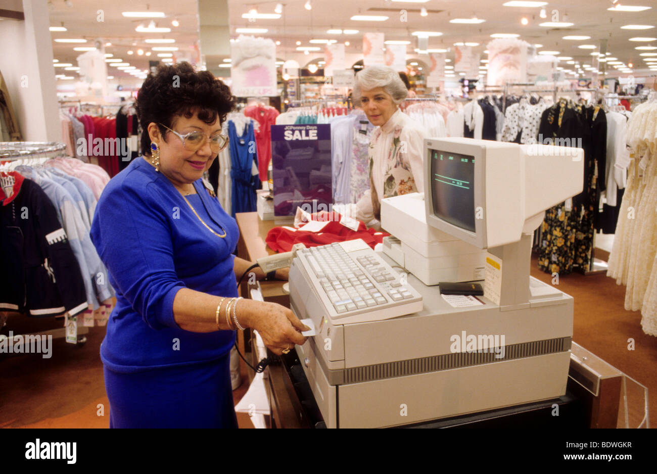 department store woman buy clothes merchandise purchase select choose ...