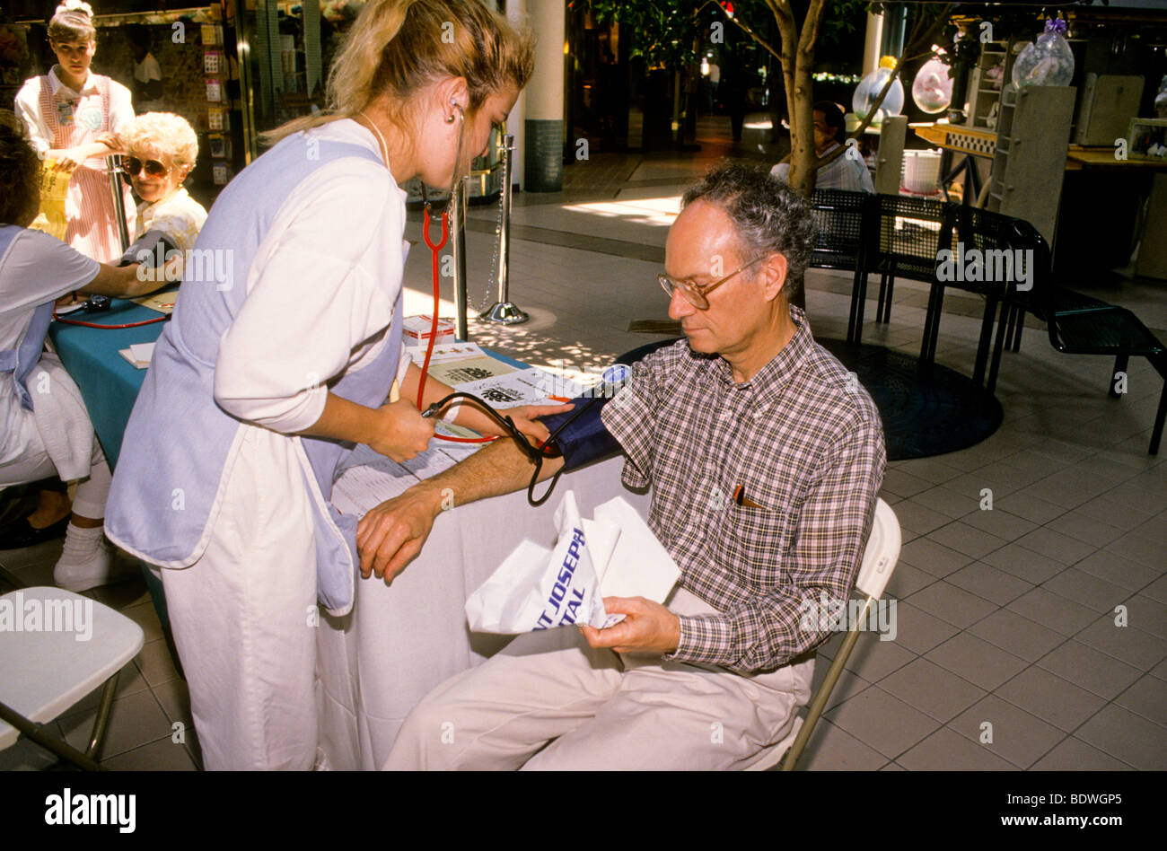 Free blood pressure checks hi-res stock photography and images - Alamy