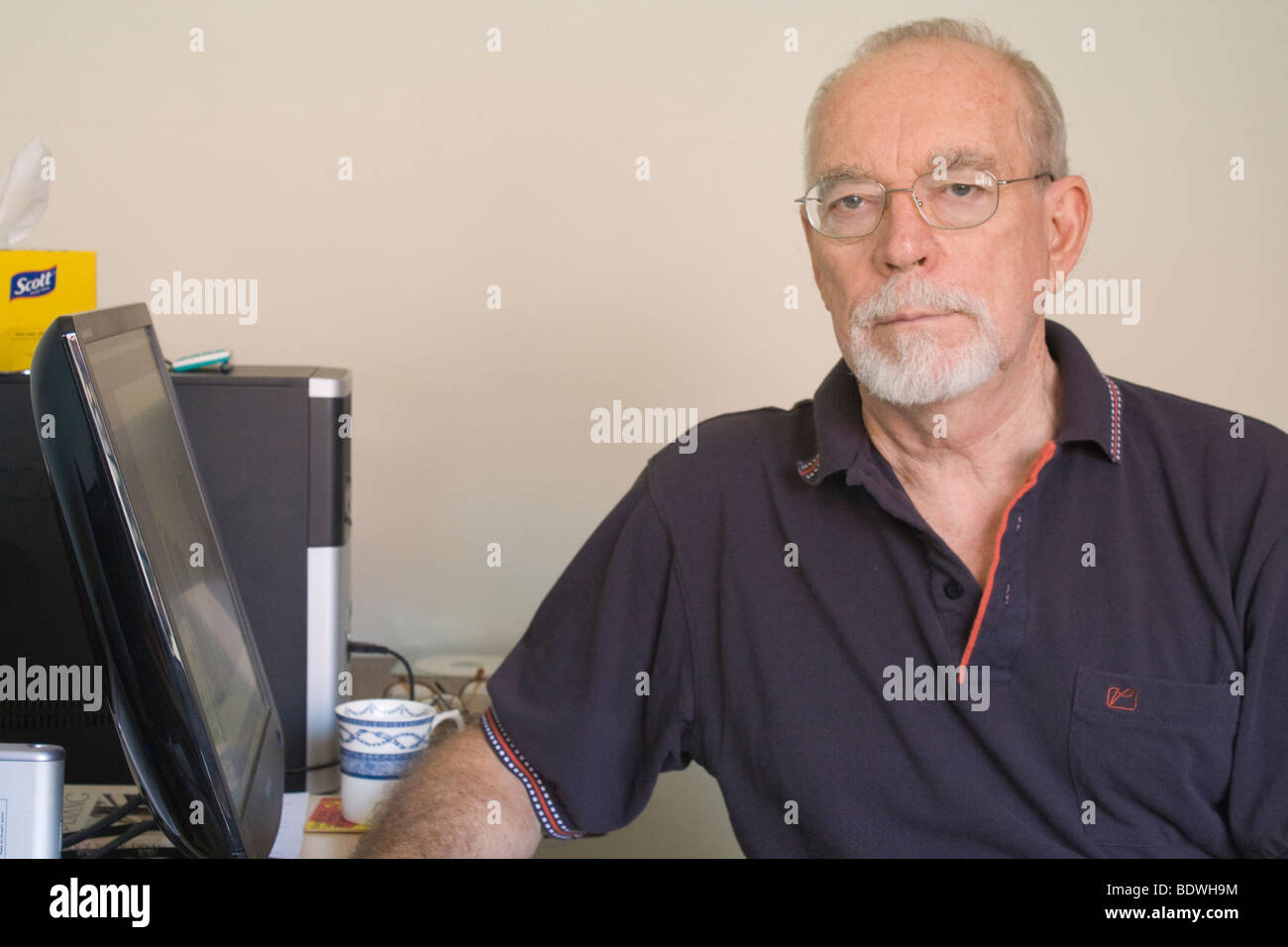 Man at computer showing emotions from puzzlement to rage Stock Photo ...