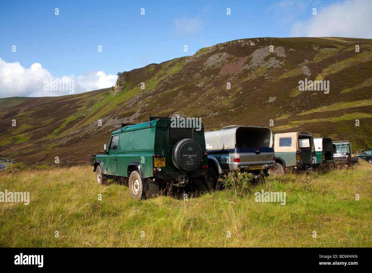 Several gamekeepers Scottish Estate vehicles parked on Invercauld ...