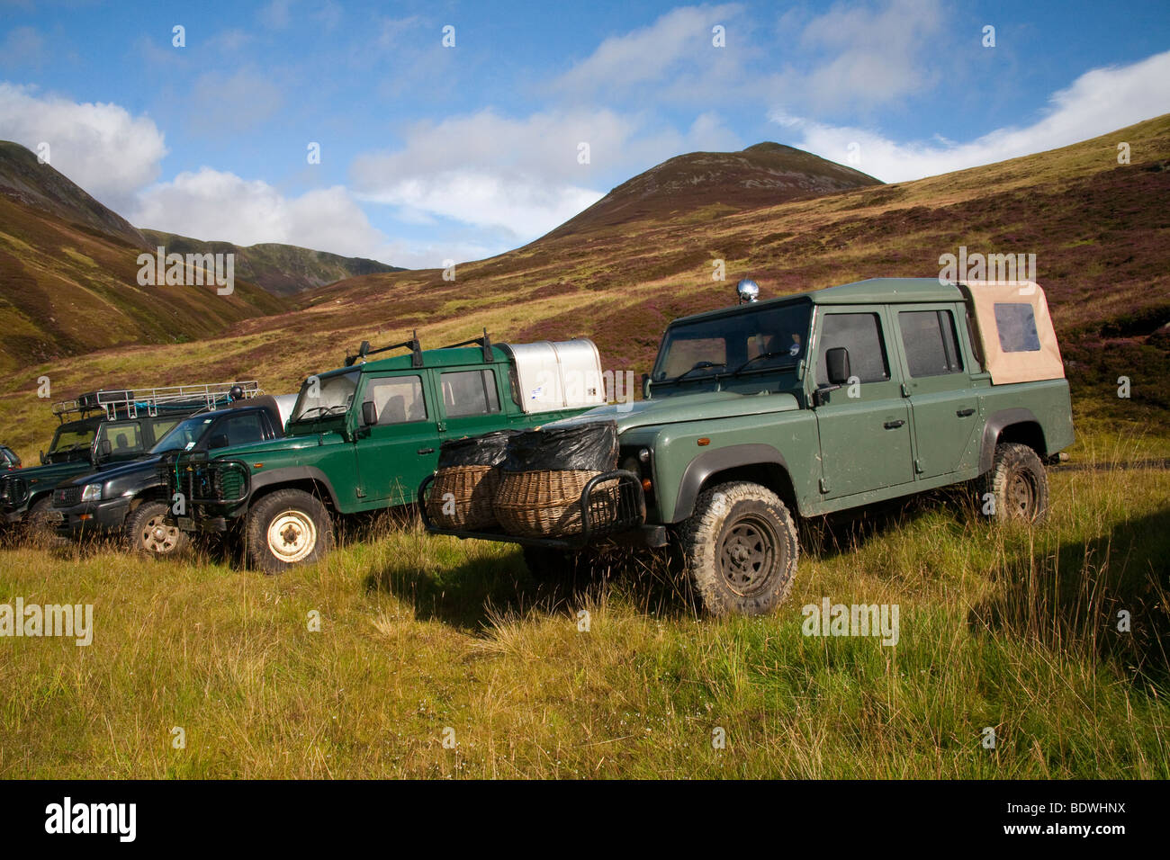 Several gamekeepers Scottish Estate vehicles parked on Invercauld ...