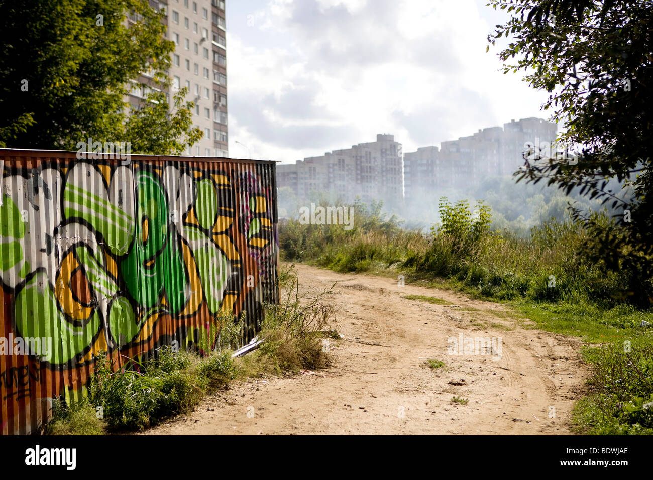 Urban landscape with graffiti. Road and building Stock Photo - Alamy