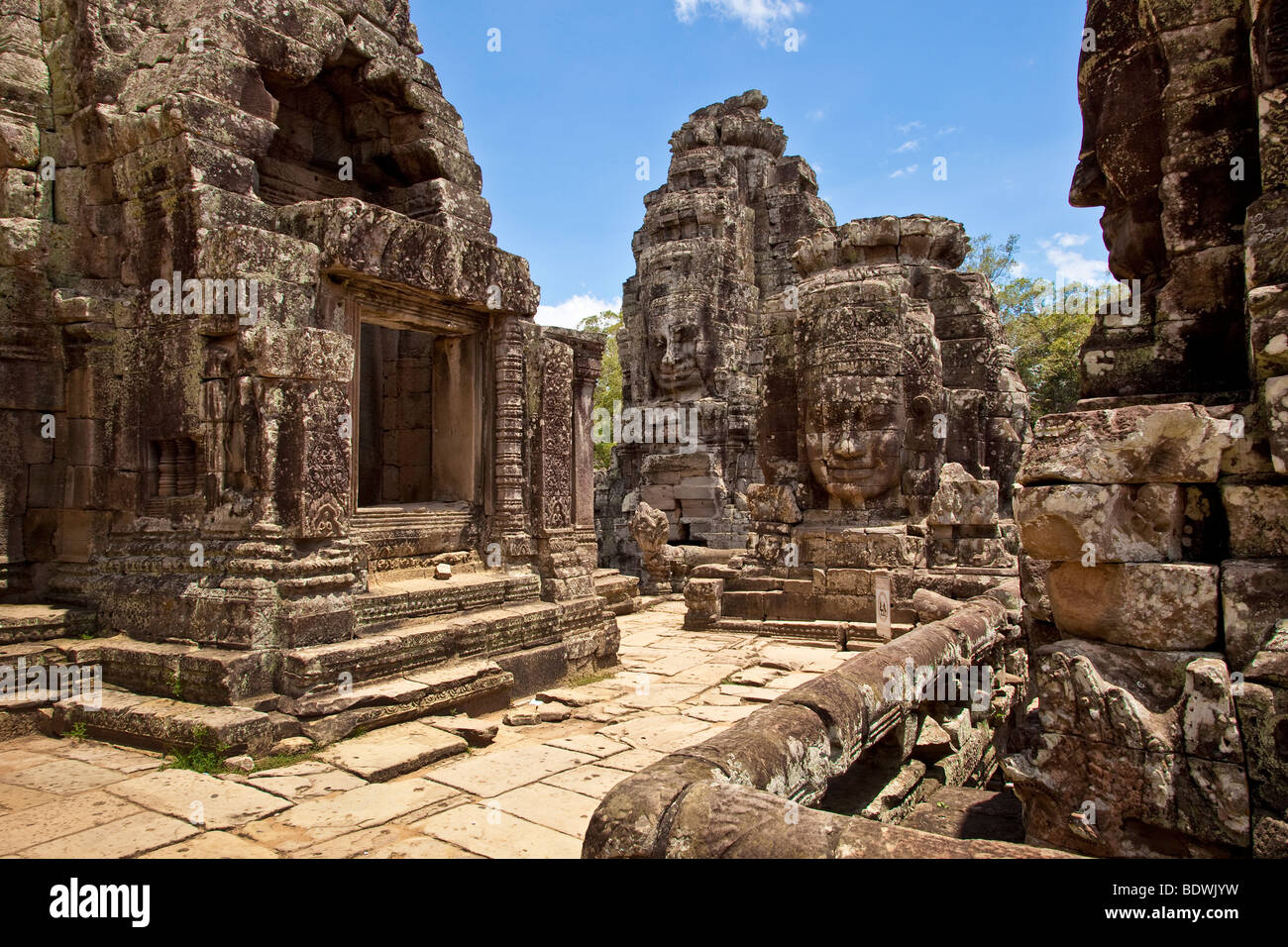 Angkor wat temple faces hi-res stock photography and images - Alamy