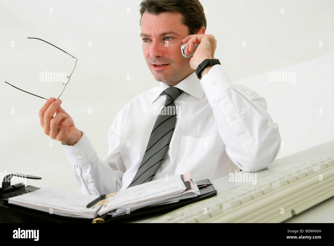 MAN ON THE PHONE Stock Photo - Alamy