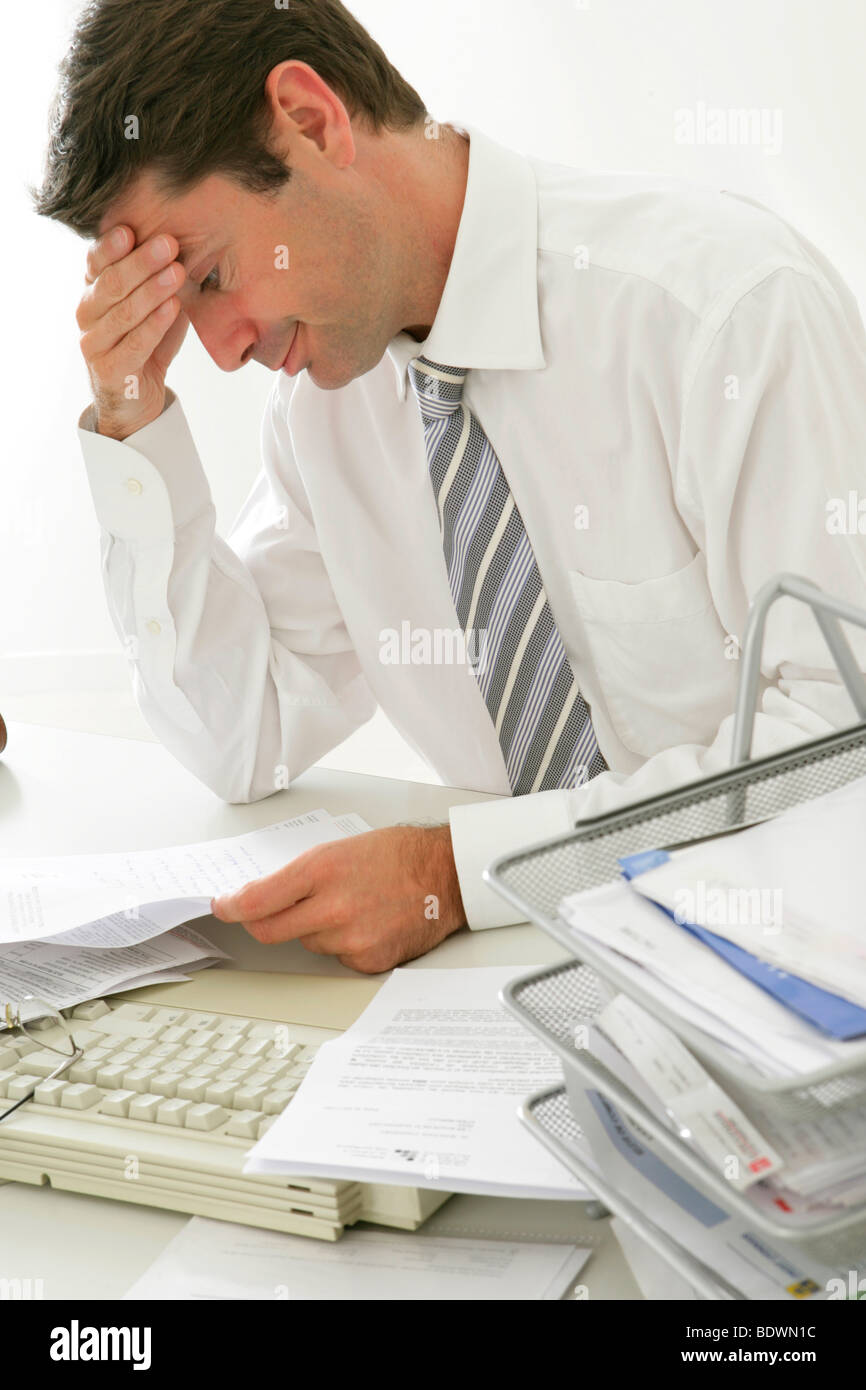 STRESSED MAN INDOORS Stock Photo - Alamy
