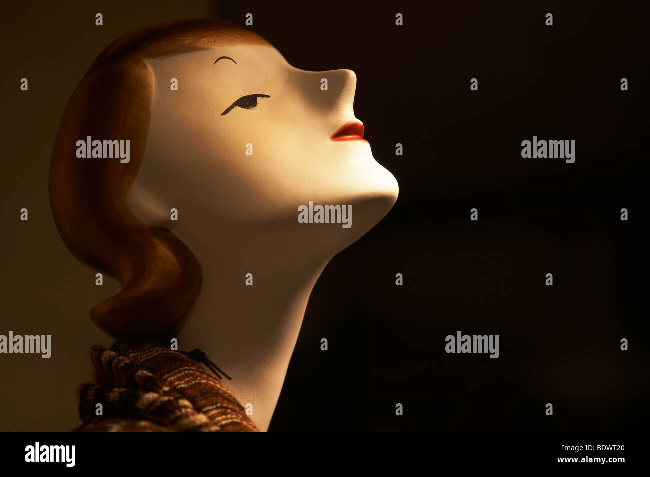 Female, cheeky window dummy, looking up Stock Photo - Alamy