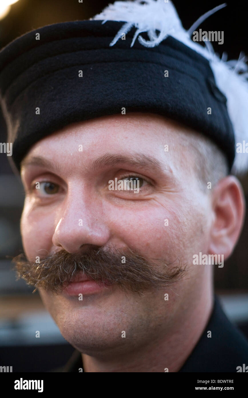 A man in traditional Hungarian folk costume performs at a cultural ...