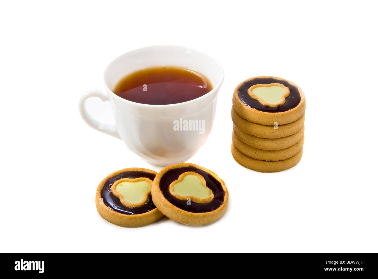 Cup of tea and cookies isolated on white background Stock Photo - Alamy