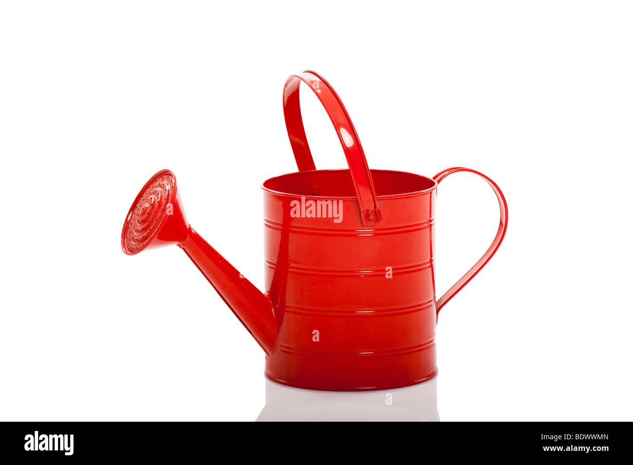 Red watering can isolated on white background Stock Photo - Alamy