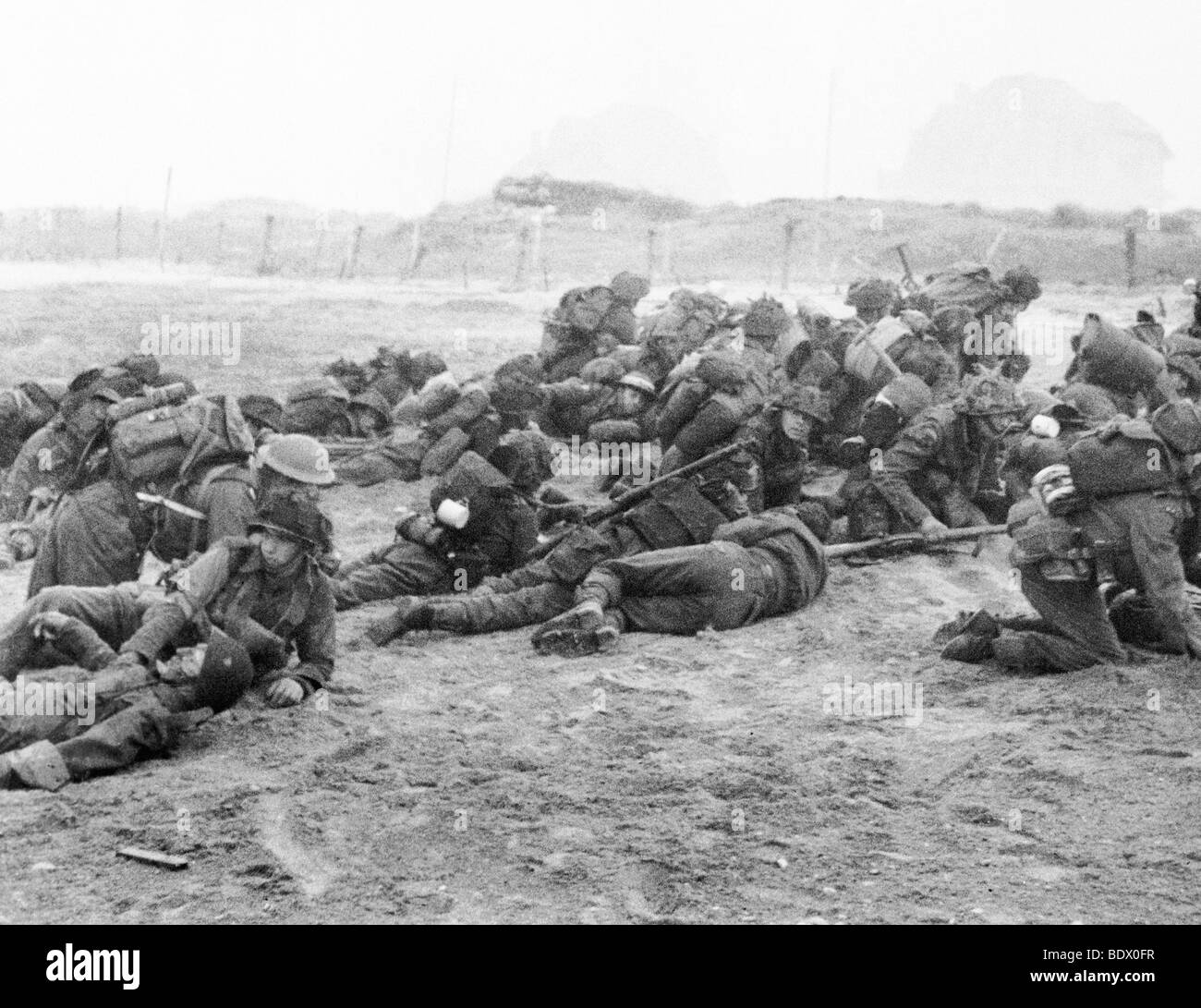 6 JUNE 1944 - British troops of the Suffolk Regiment under heavy fire ...