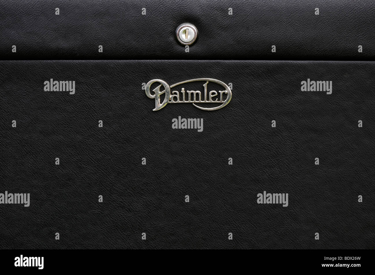 Vintage Daimler badge on leather box Stock Photo - Alamy