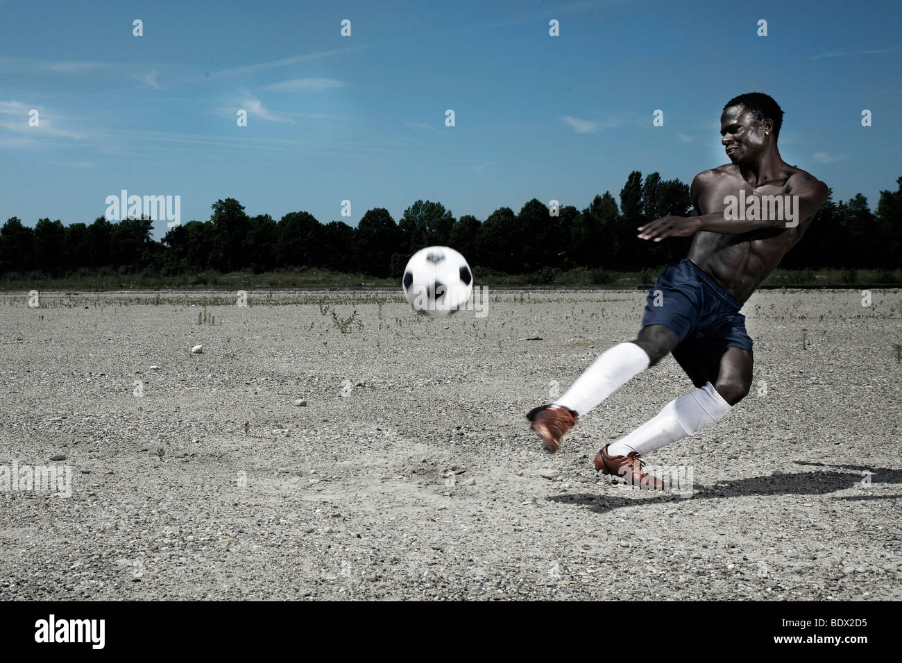 Young black footballer hi-res stock photography and images - Alamy