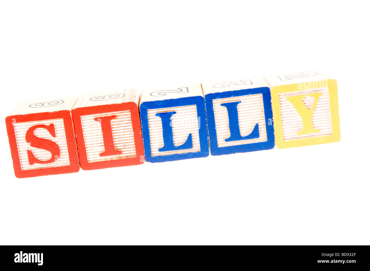 Wooden building Blocks spelling Silly Stock Photo - Alamy