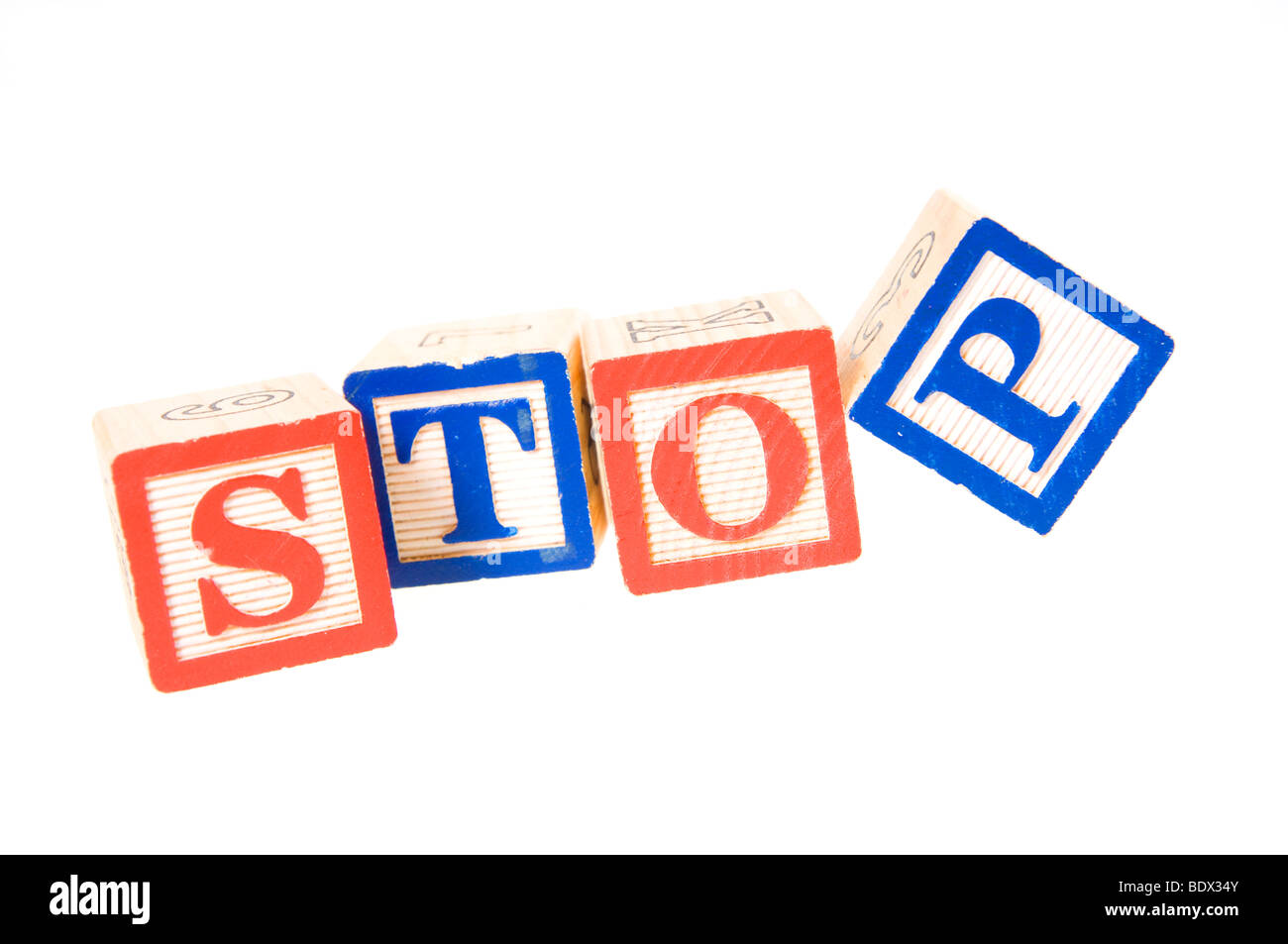 Wooden building Blocks spelling Stop Stock Photo - Alamy