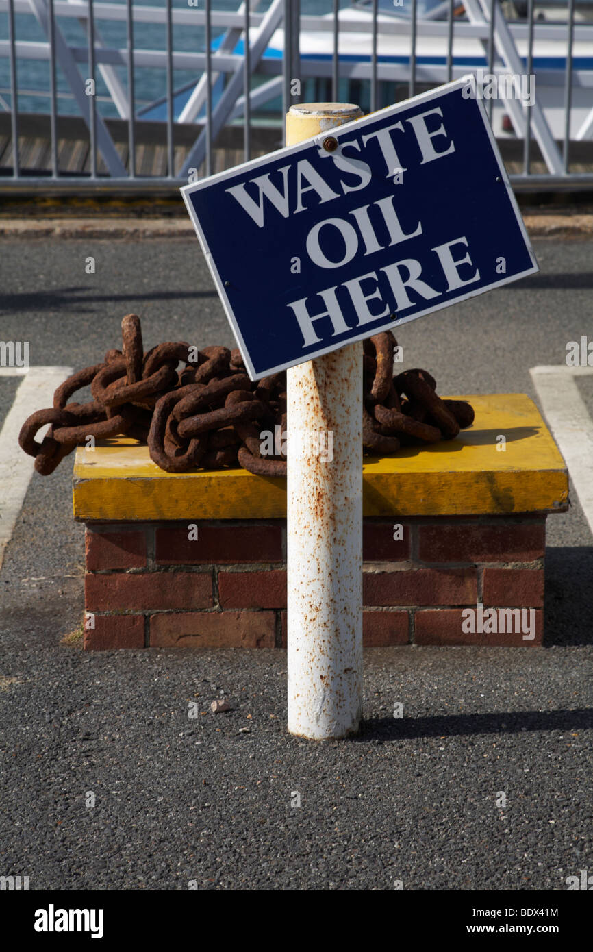 Waste Oil Here sign Stock Photo - Alamy