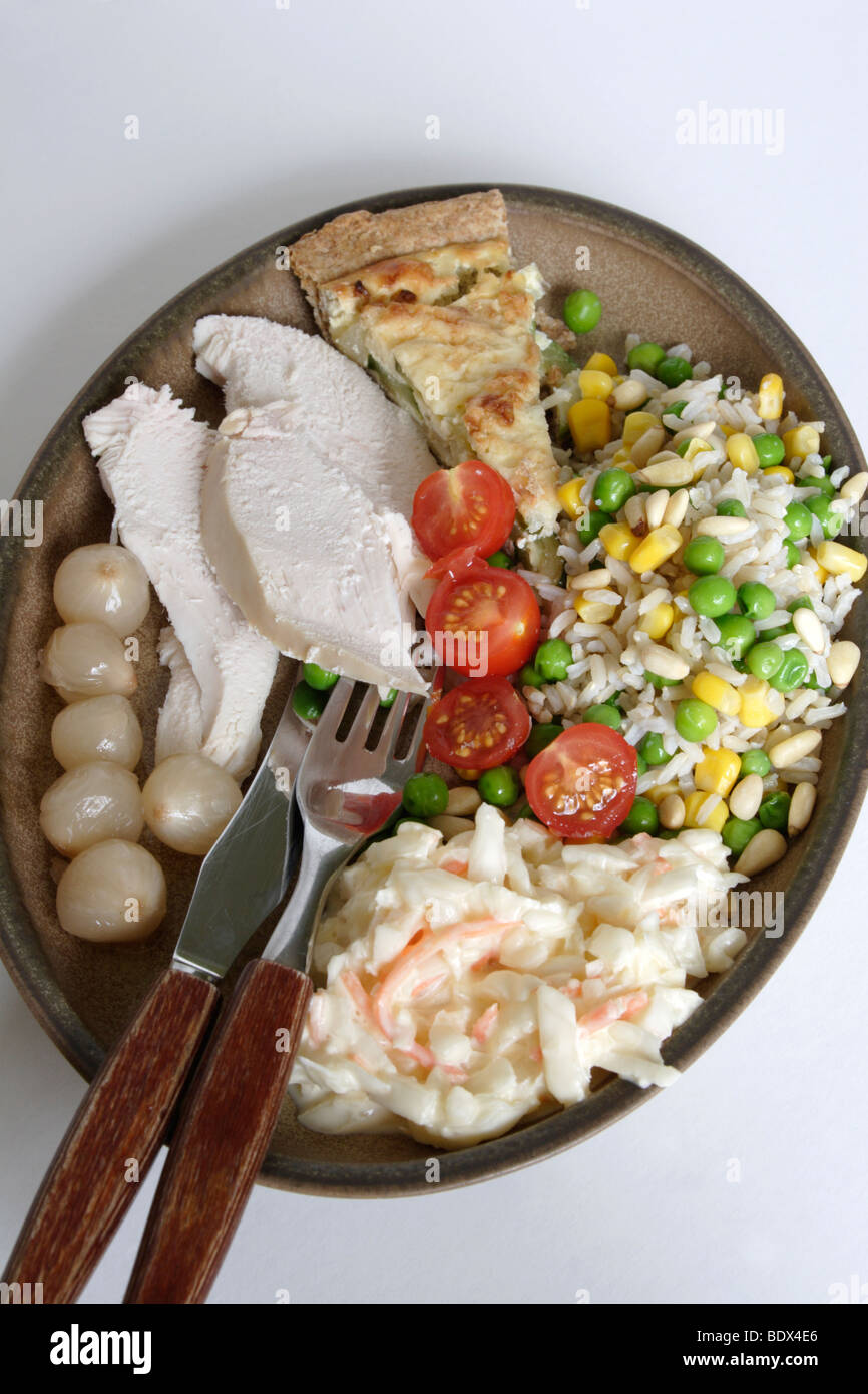 Selection of food on dinner plate Stock Photo - Alamy
