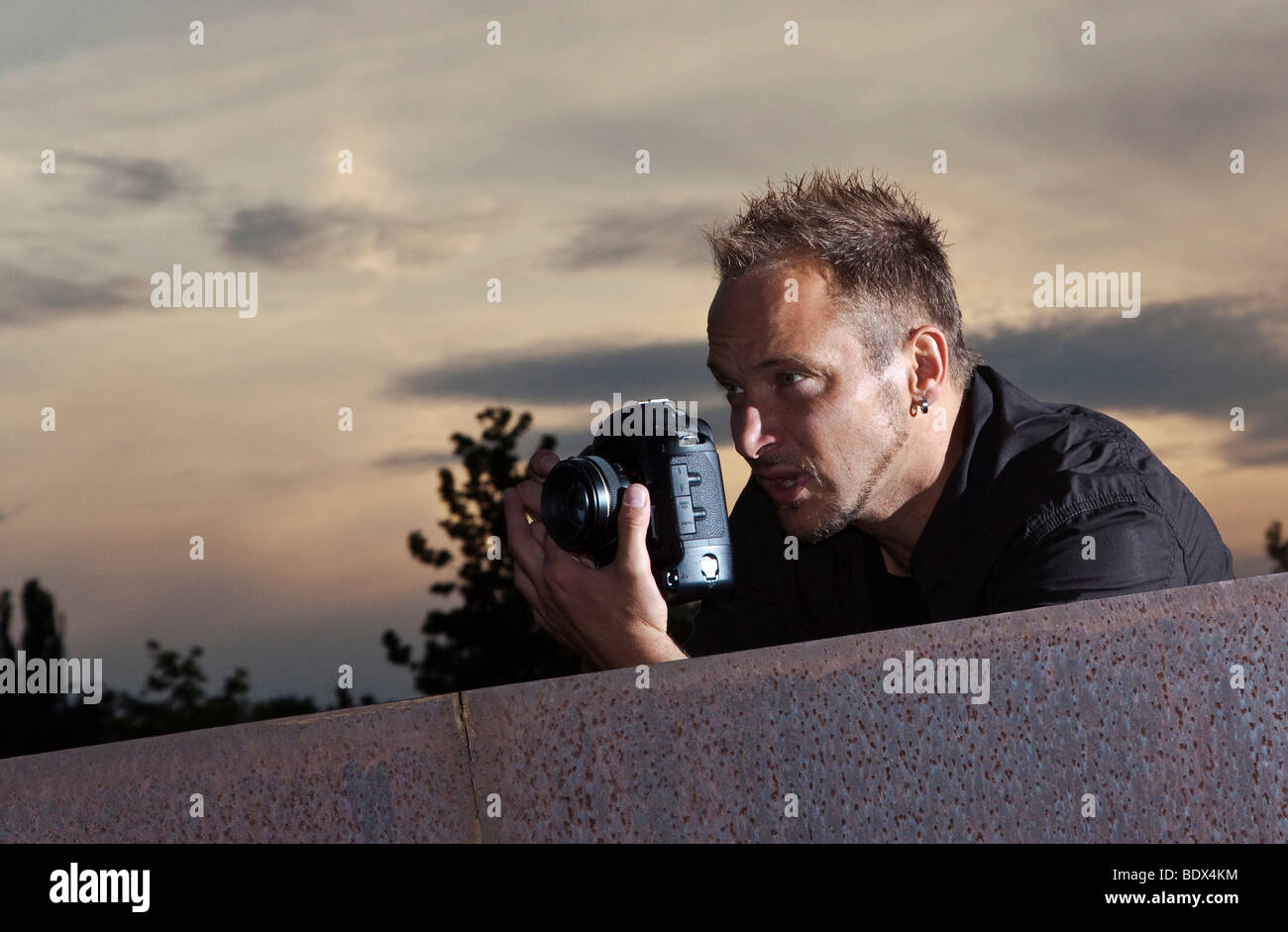 Photographer at work Stock Photo - Alamy