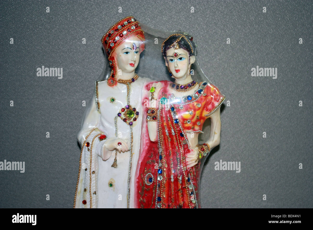 statue / model of a couple after marriage in traditional wedding dress ...