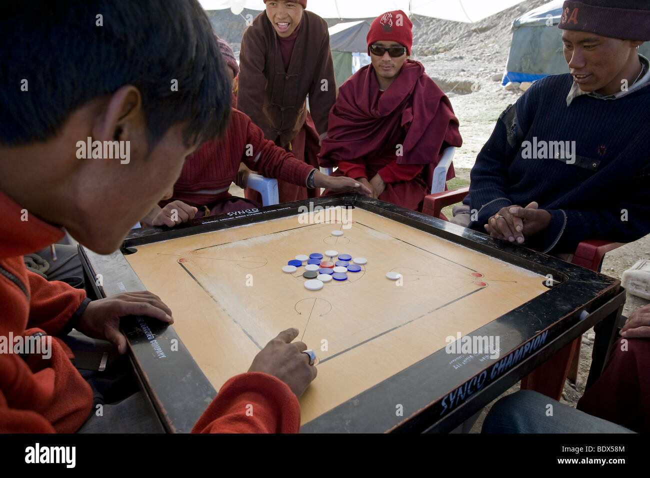 Monks playing karom. Korzok village. Ladakh. India Stock Photo - Alamy