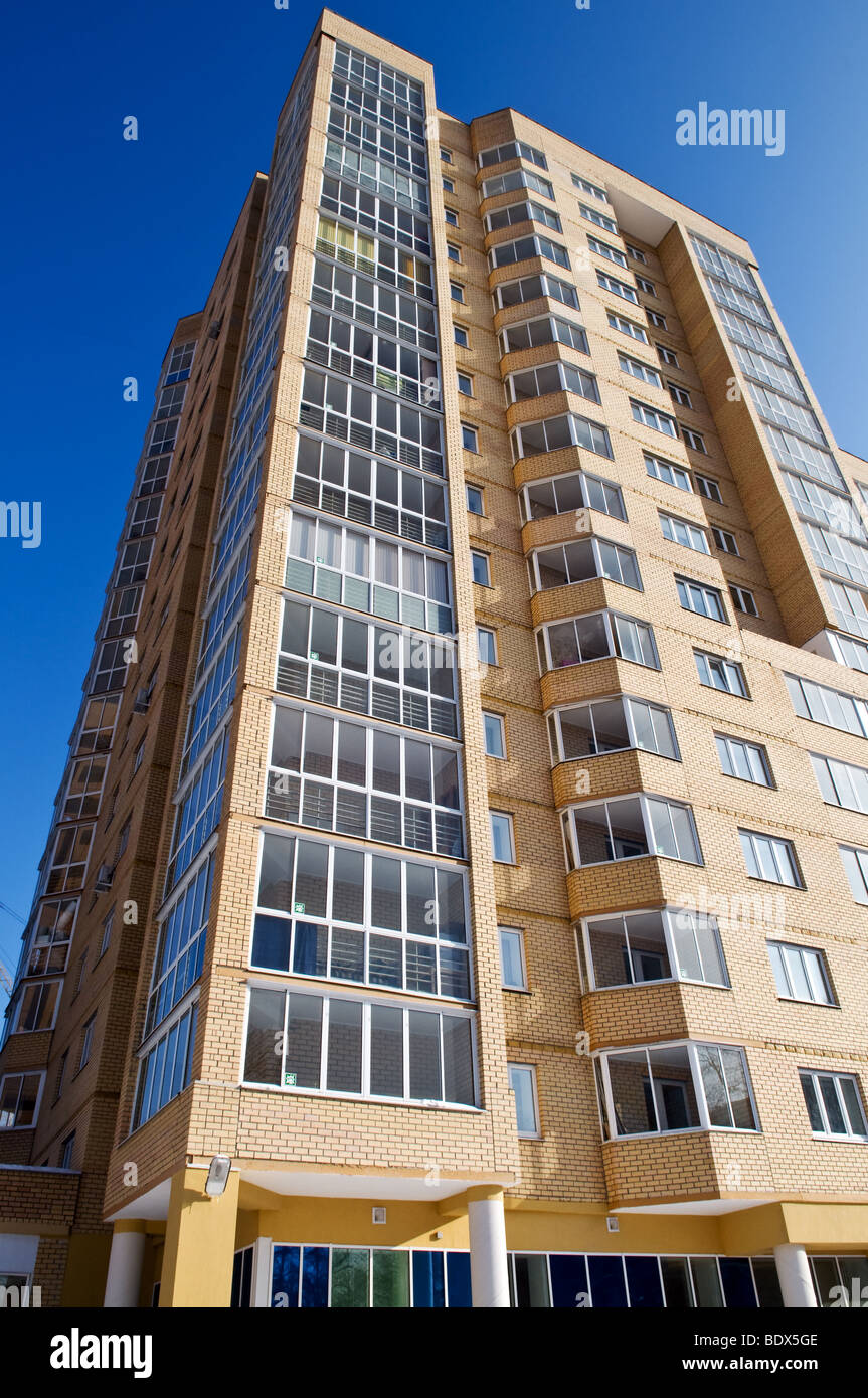 high residential building on a blue background Stock Photo - Alamy