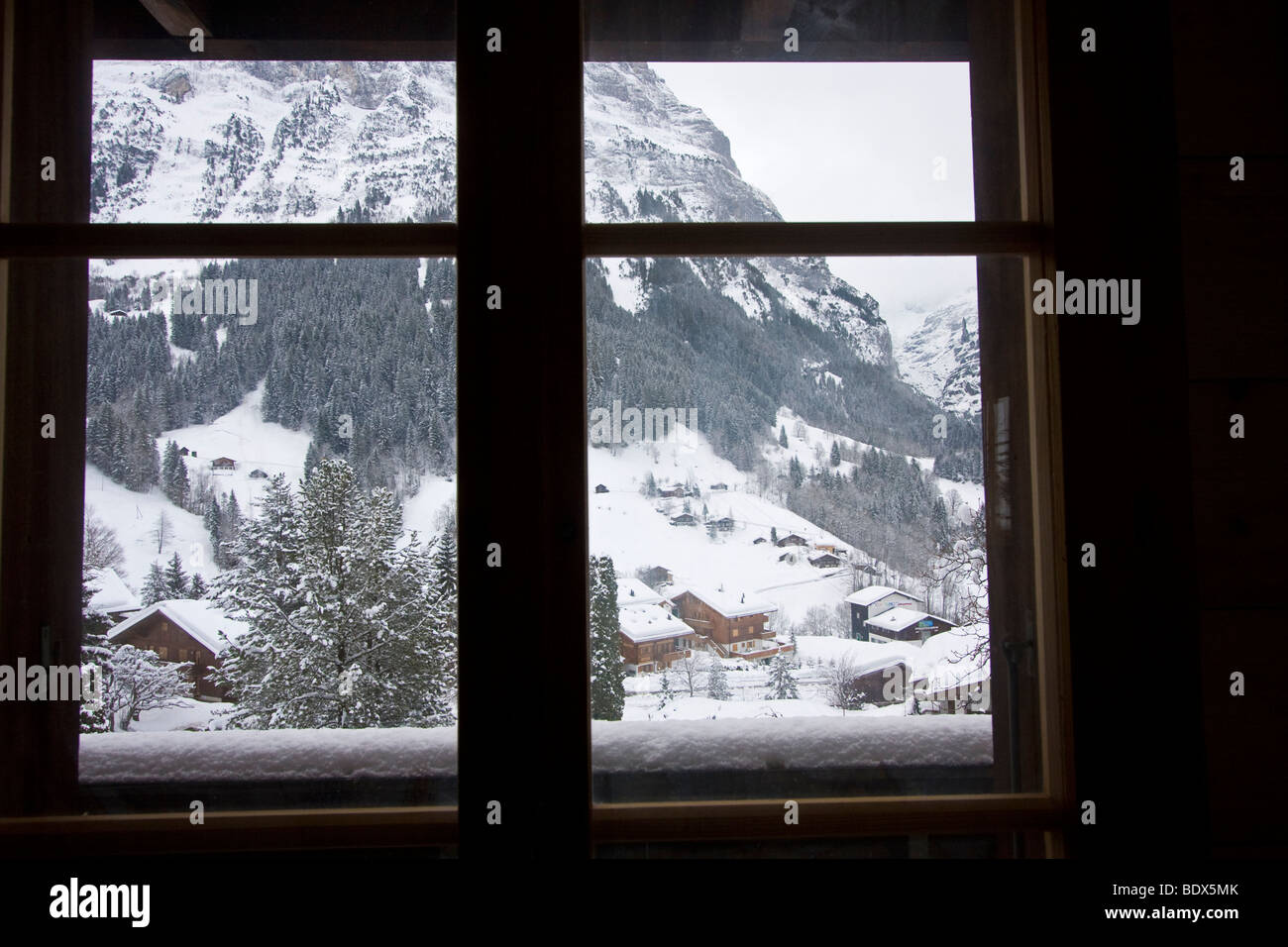 View of Grindelwald, Switzerland through a window Stock Photo - Alamy