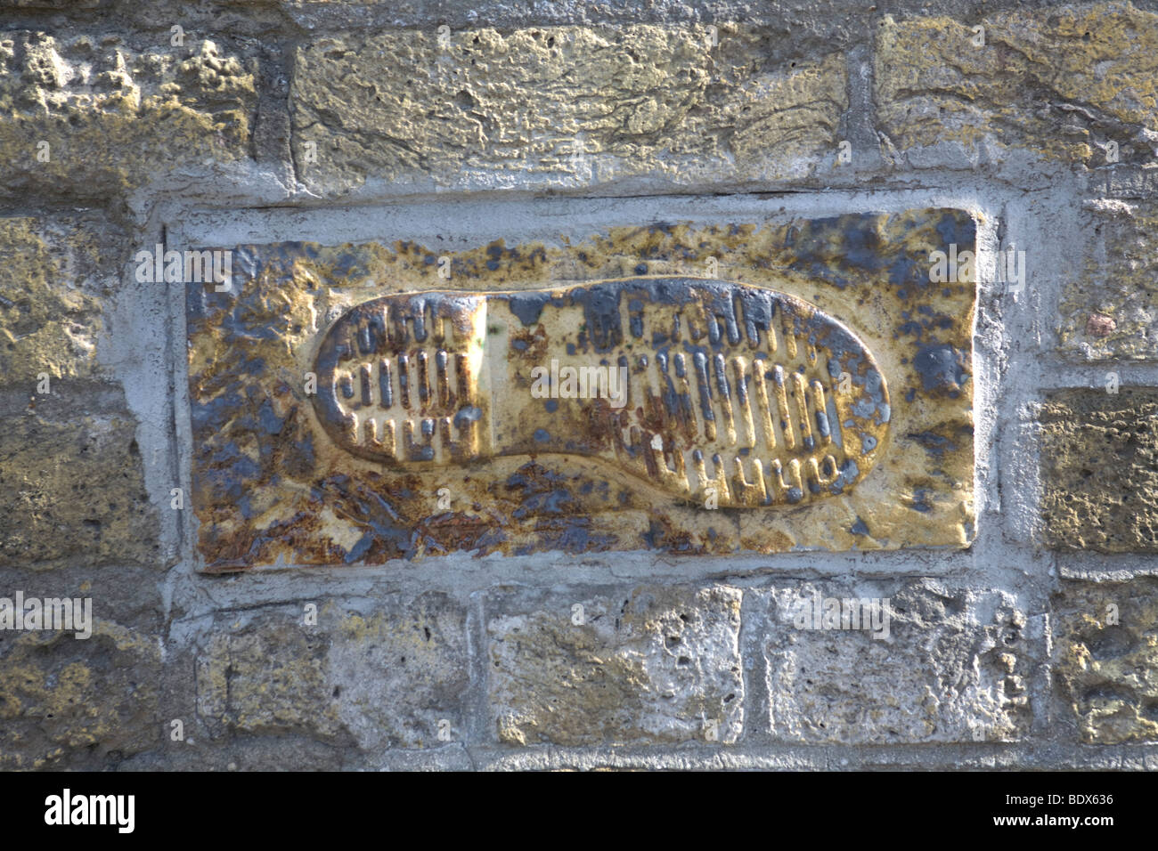 footprint on the wall Stock Photo - Alamy