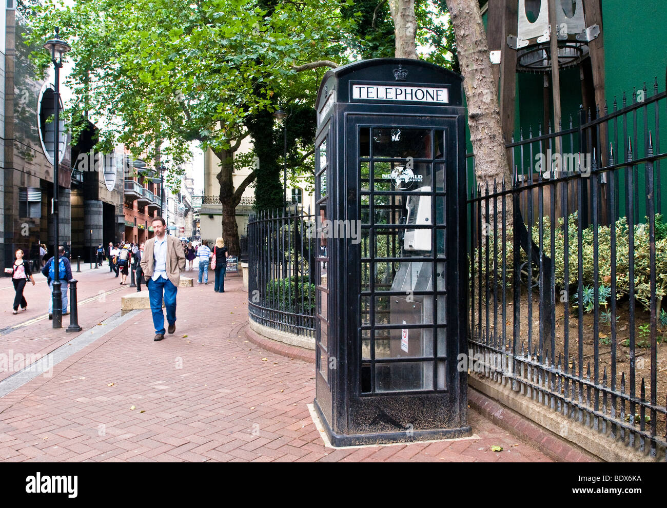 A black telephone box in the City Of Westminster London Stock Photo - Alamy