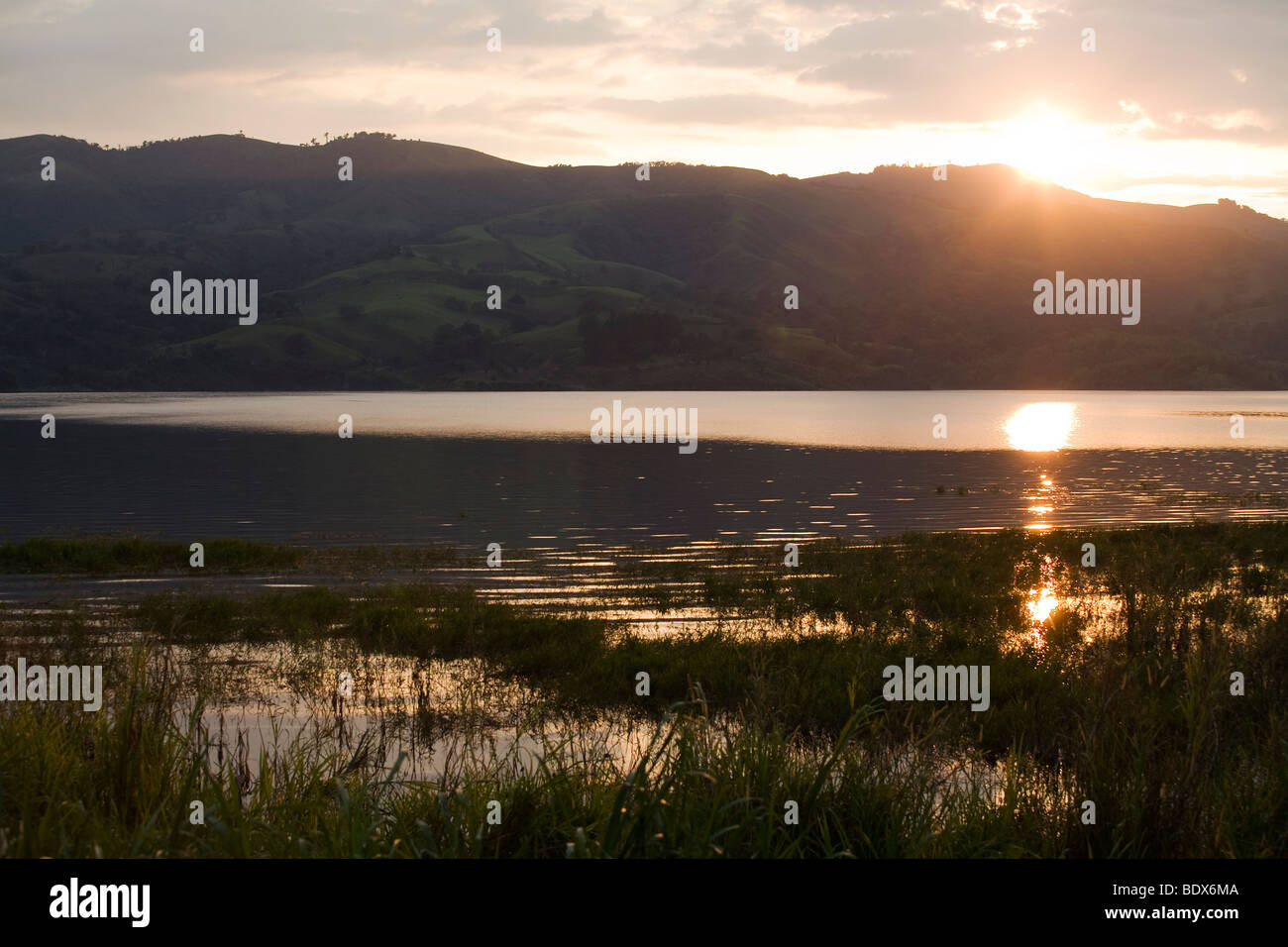 Sunset view across lake arenal in Costa Rica Stock Photo - Alamy