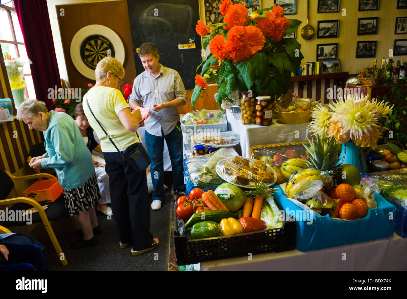 Annual harvest festival charity auction of food and local produce held ...