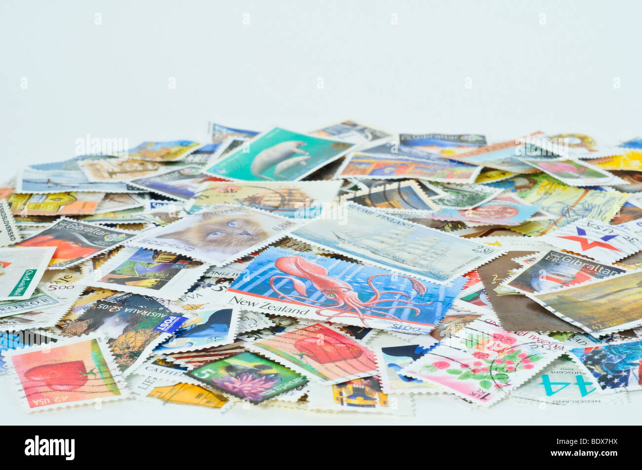 Assortment of postage stamps Stock Photo - Alamy