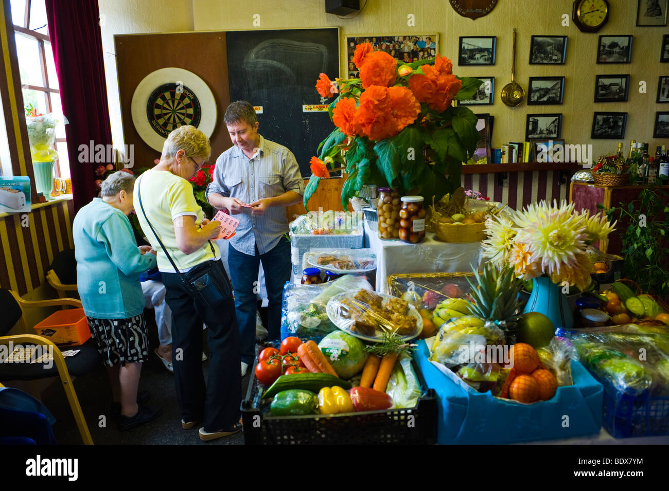 Annual harvest festival charity auction of food and local produce held ...